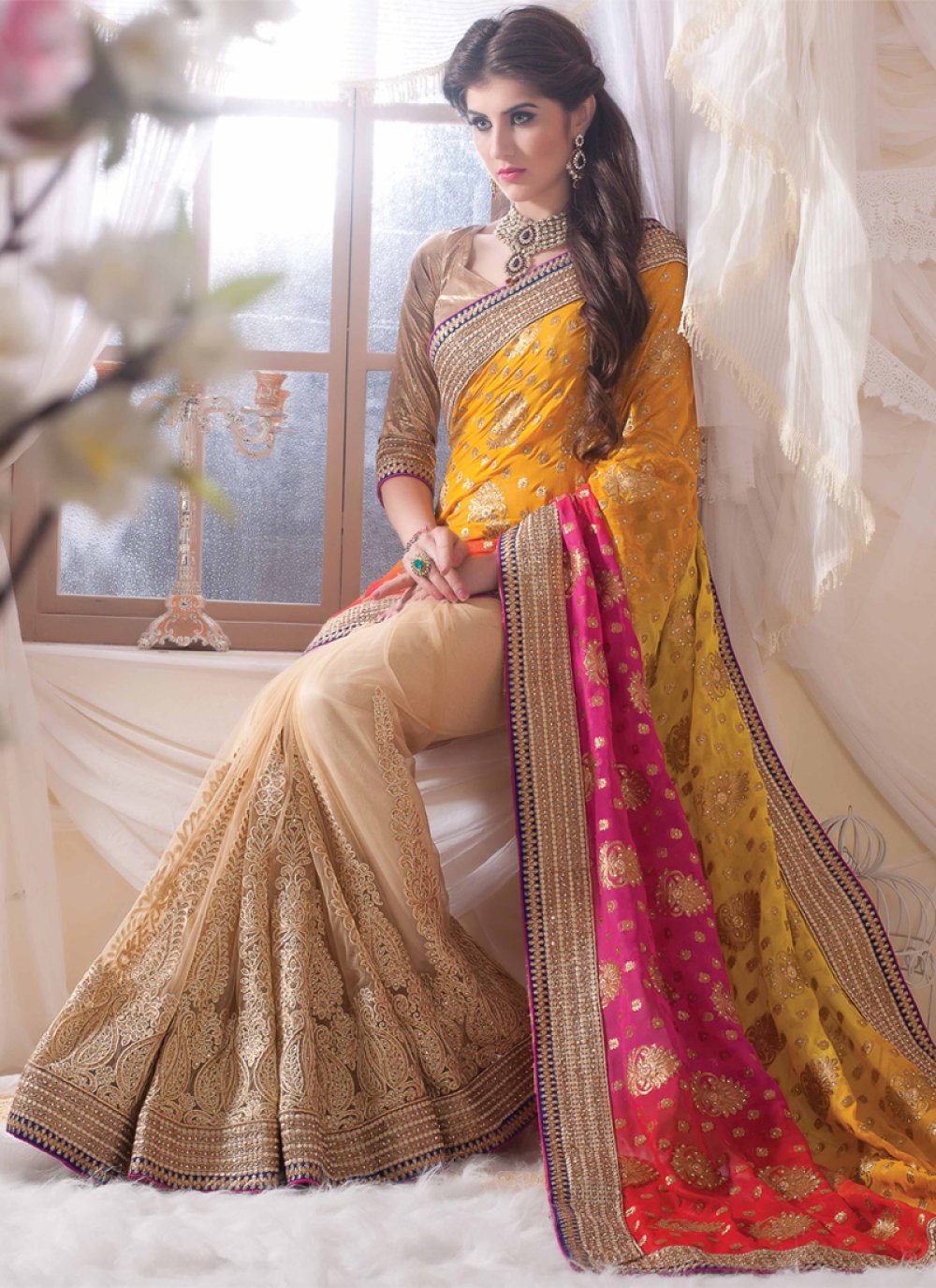 Cream And Gold Net Designer Saree
