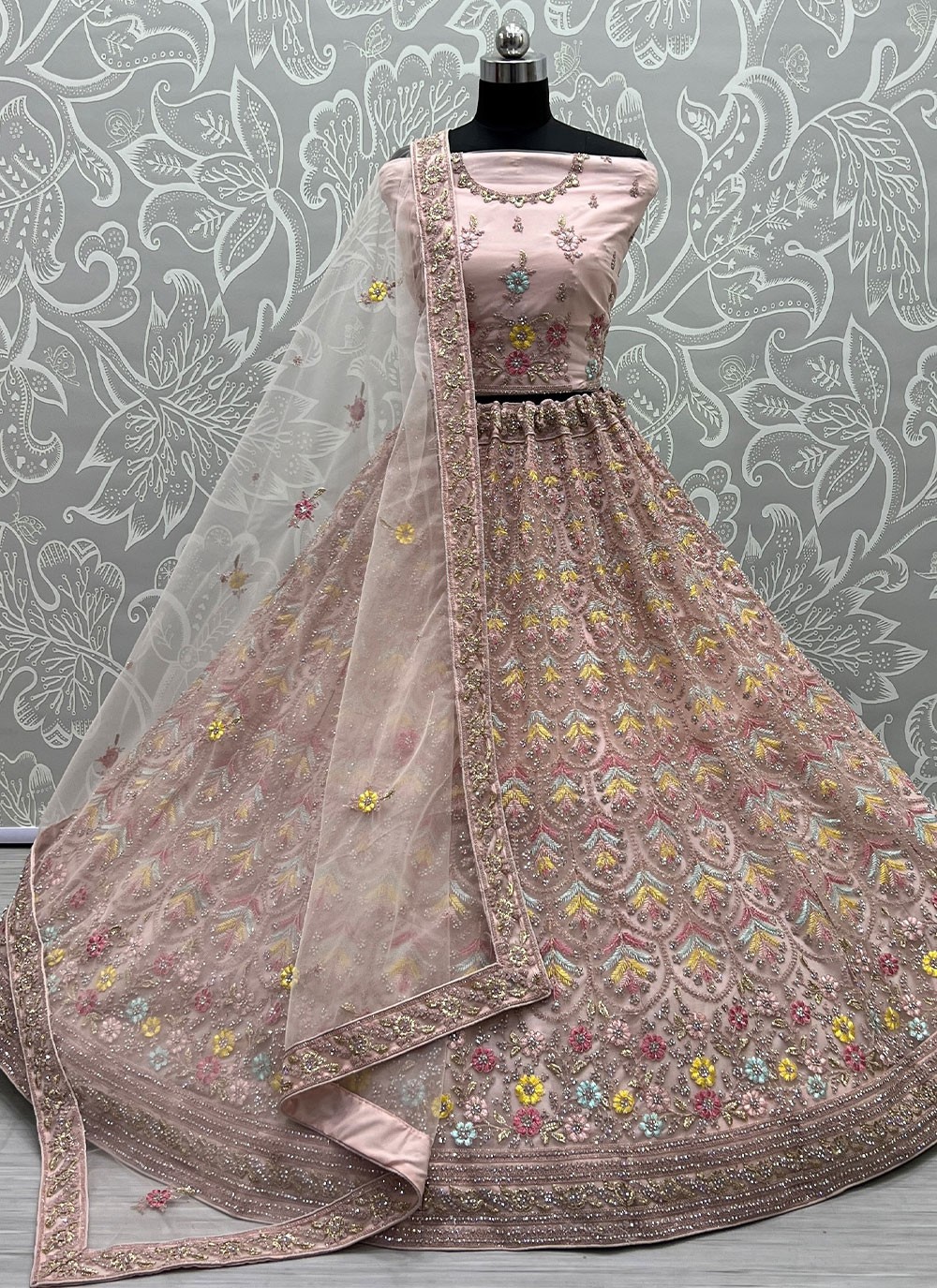 Net Peach Machine Embroidery Trendy Lehenga Choli buy online