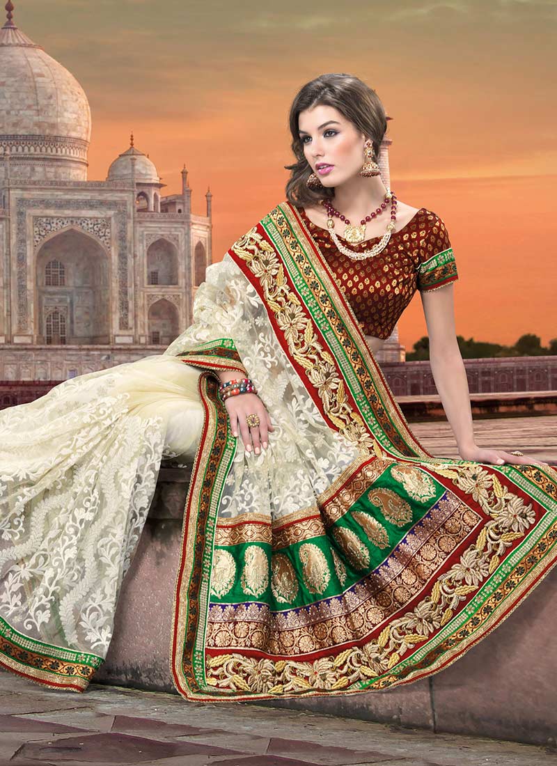 Sizzling Pale Cream Embroidered Net Saree